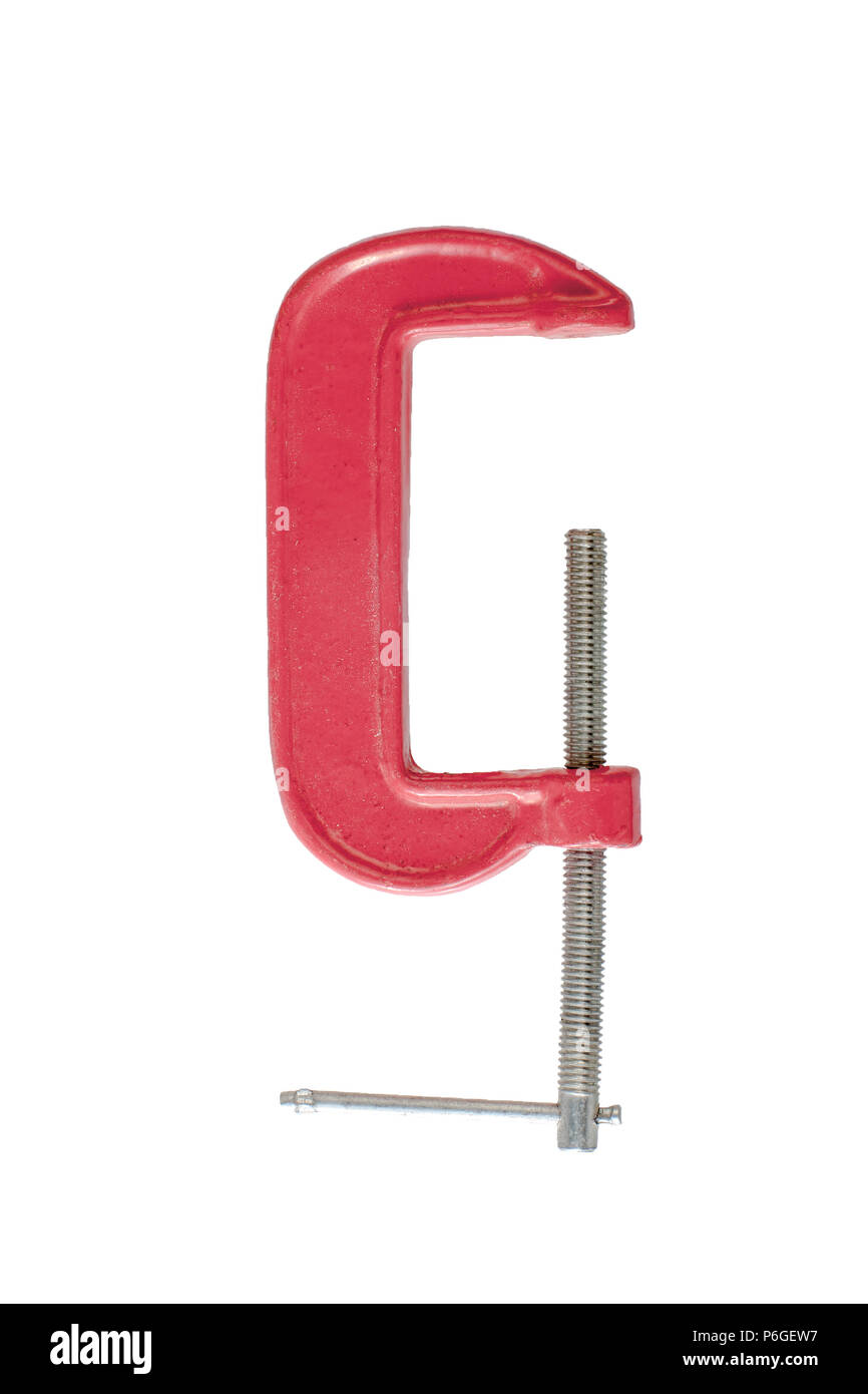 red metal vise isolated on white background. old screw clamp tool for ...