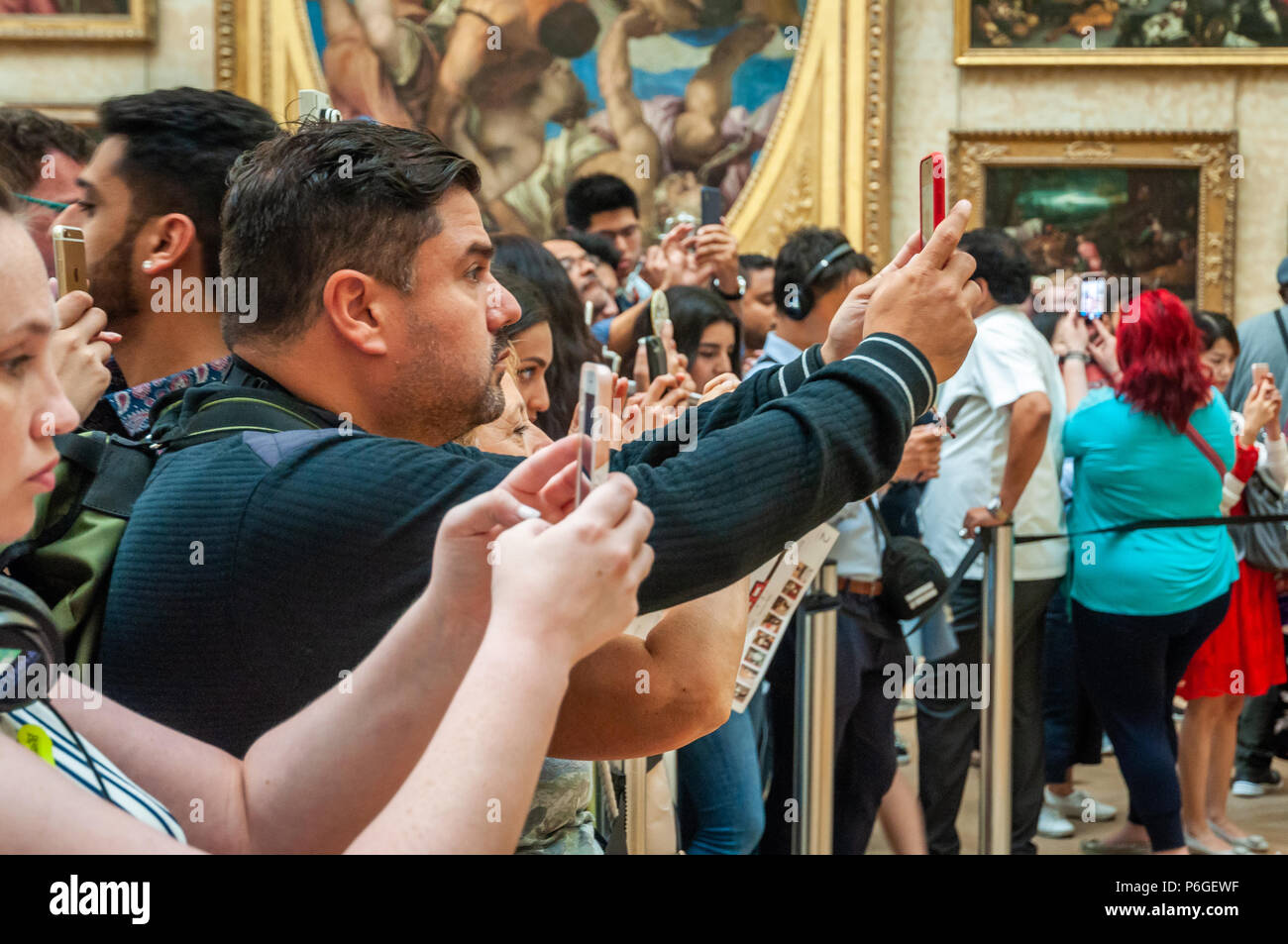 People consuming art Stock Photo - Alamy