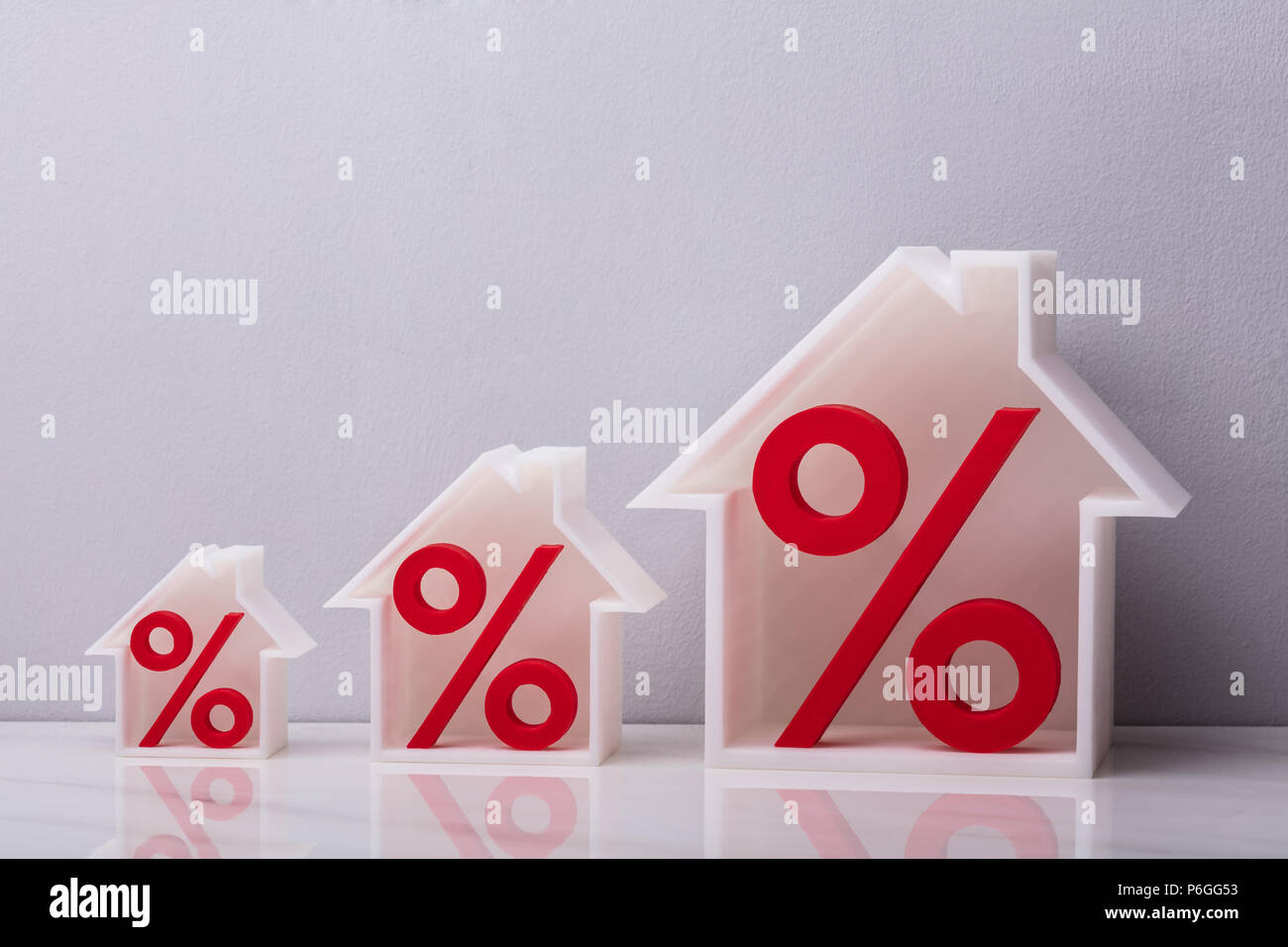 Percentage Symbols Inside Increasing House Models Against White ...