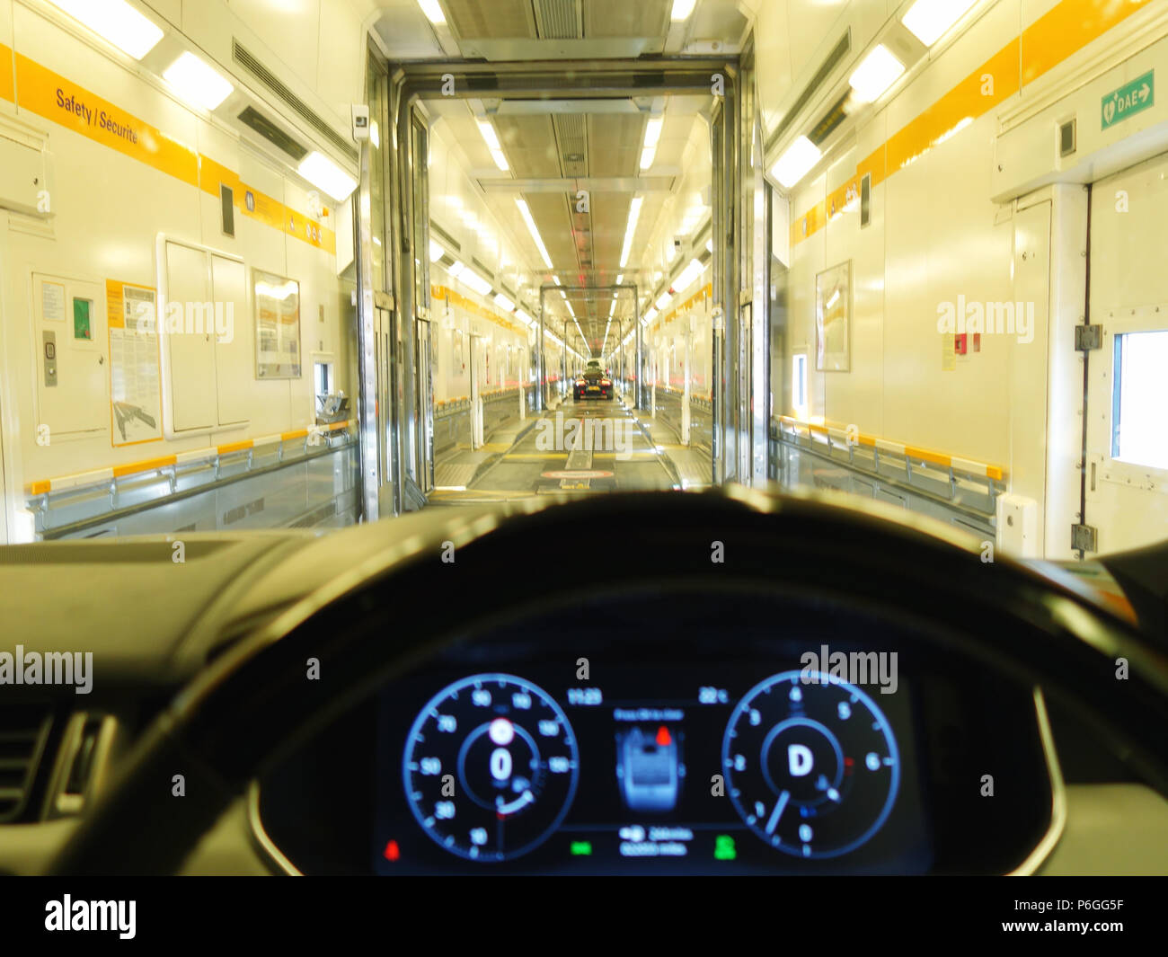 Driving a Range Rover into the Eurotunnel Le Shuttle train. Photograph ...