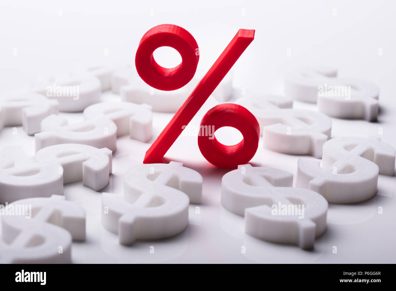 Red Percentage Symbol Surrounded By Dollar Sign Stock Photo - Alamy