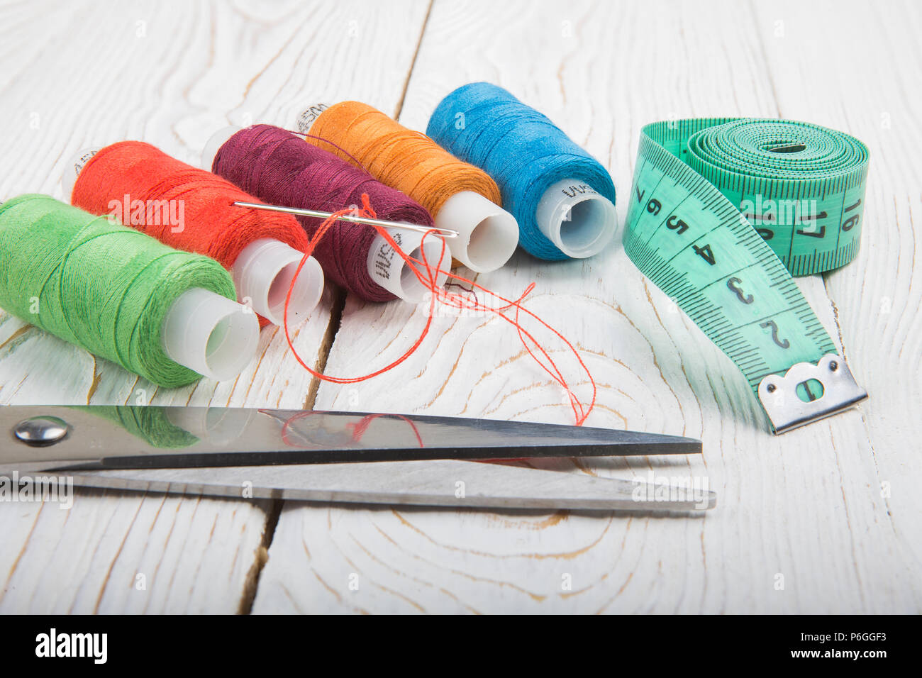 Tools for sewing- thread, scissors, pins Stock Photo - Alamy
