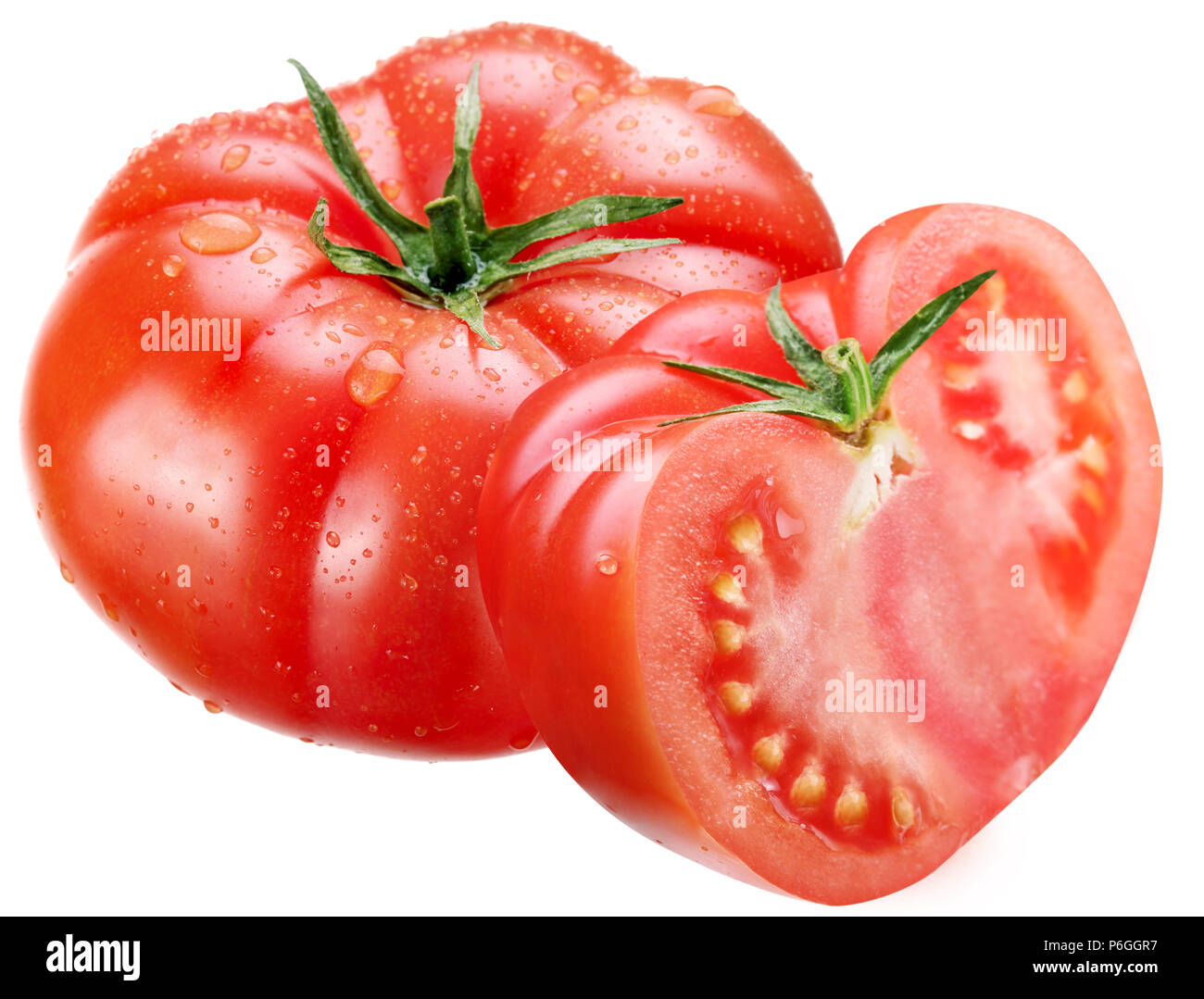 Ripe tomato and half of tomato with water drops. White background Stock ...