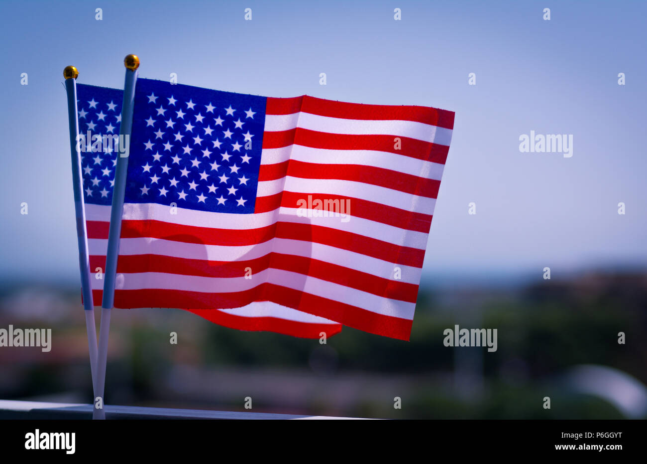 Hand waving american flag hi-res stock photography and images - Alamy