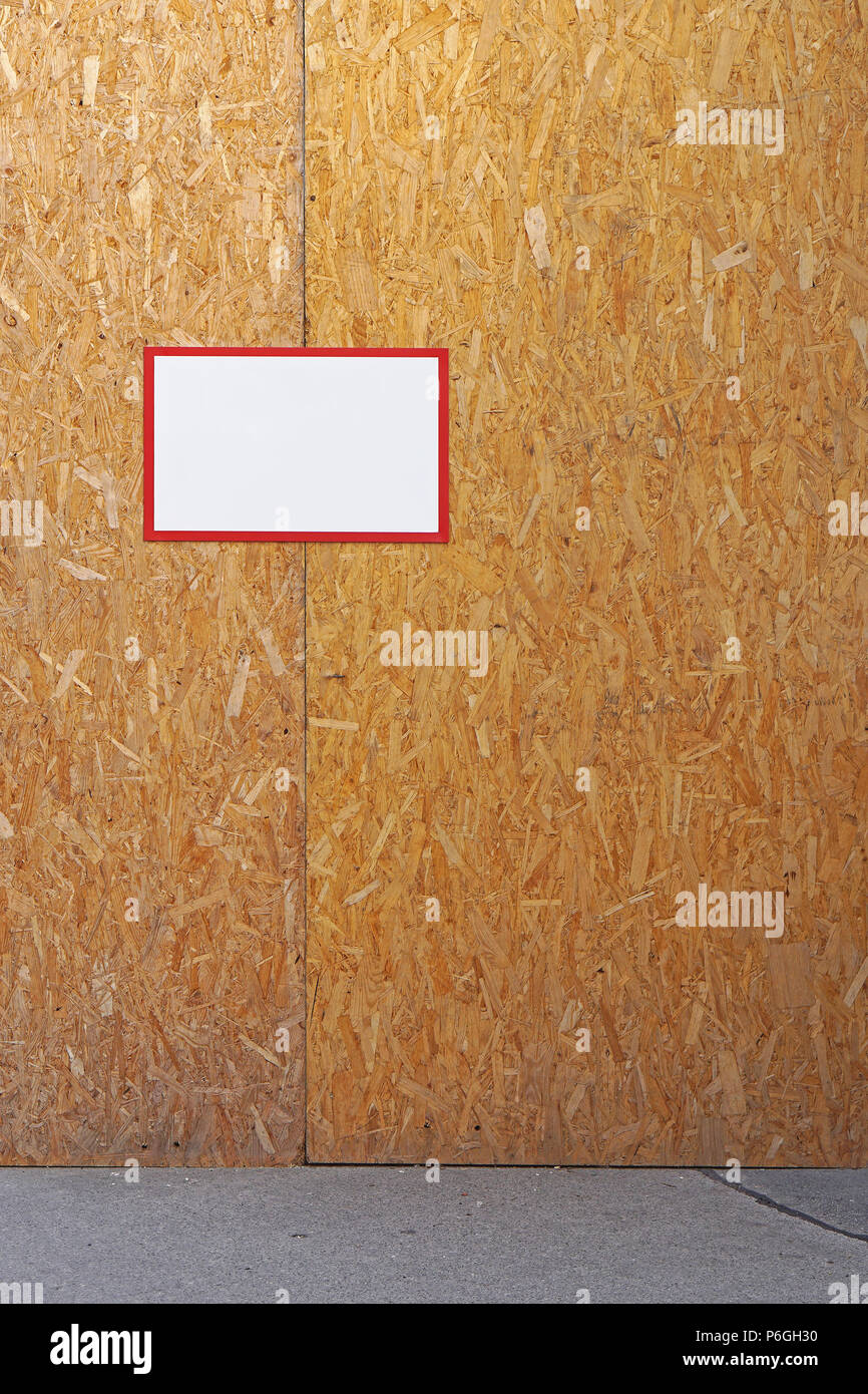 Particle board temporary wall at construction site Stock Photo - Alamy