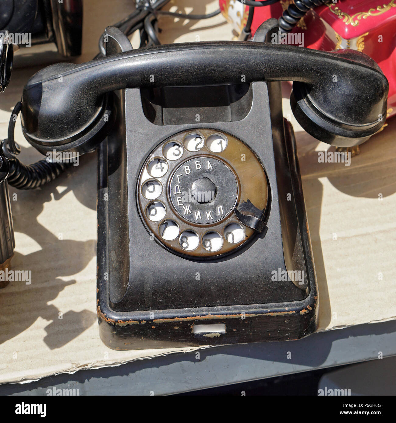 Black bakelite retro telephone at flea market Stock Photo - Alamy