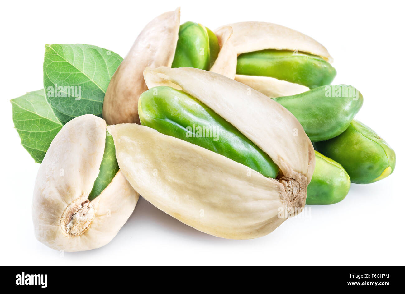 Green pistachio nuts with pistachio shell on white background Stock ...