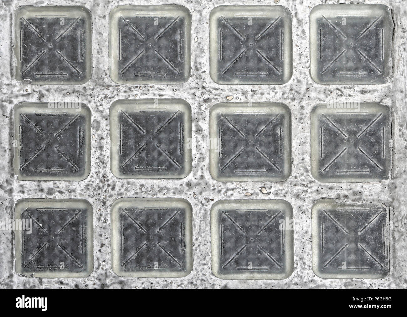 Clear glass blocks in floor pavement Stock Photo - Alamy