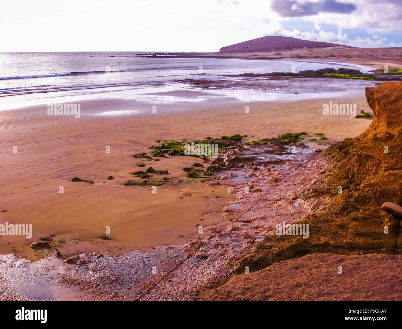 Playa de Las Americas shore with the ocean and the rocks. Tenerife ...