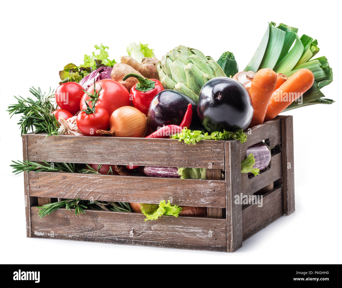 Fresh multi-colored vegetables in wooden crate Stock Photo - Alamy