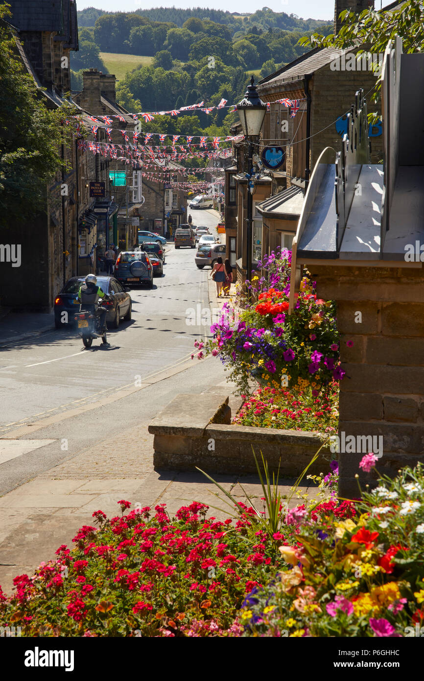Pateley Bridge High Street on a bright and sunny end of June afternoon ...