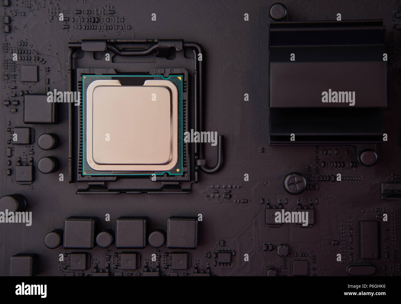 cpu installed on black motherboard, central processing unit on dark ...