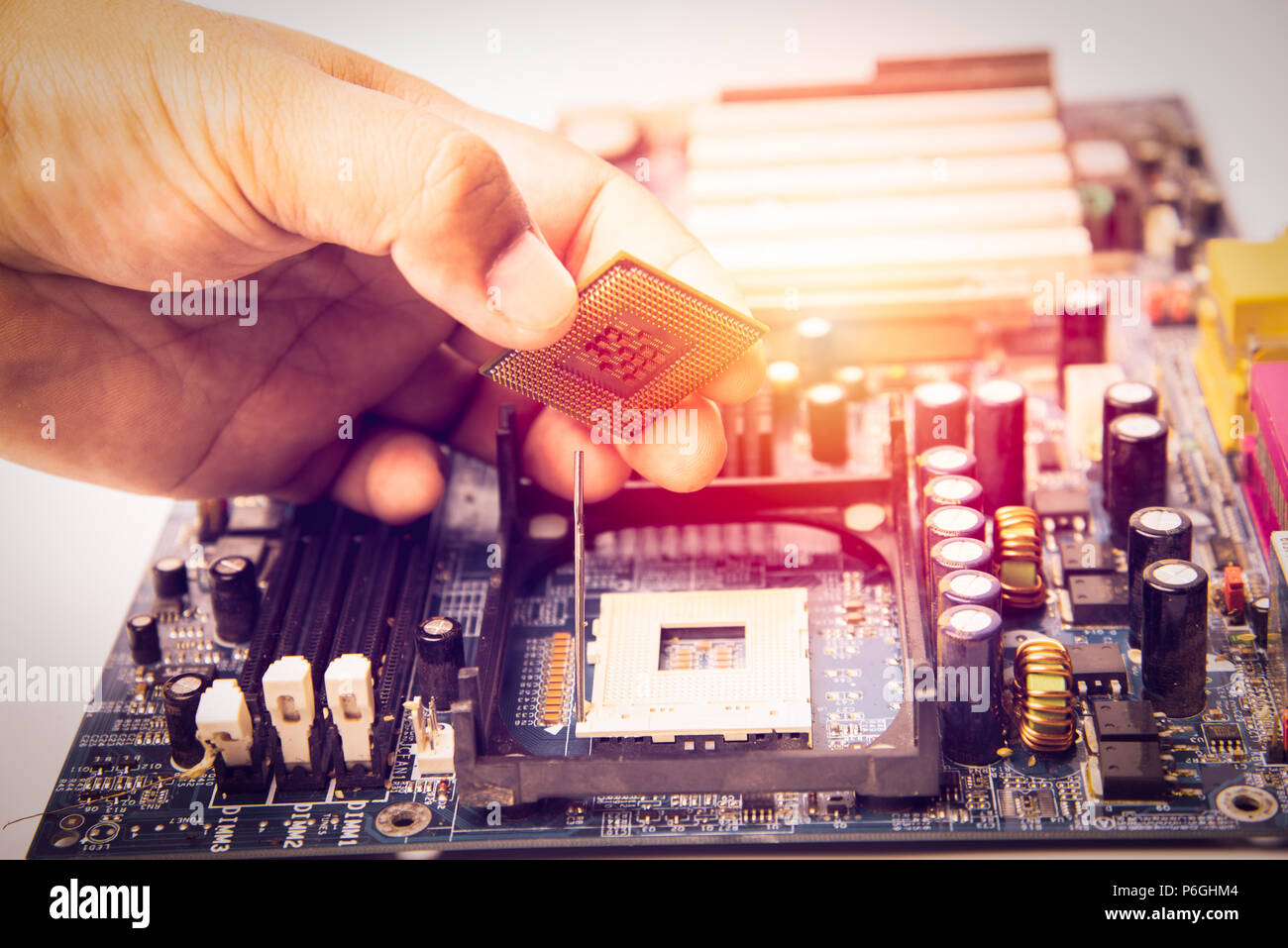 asian man holding CPU and stalling or fixing PC Stock Photo - Alamy