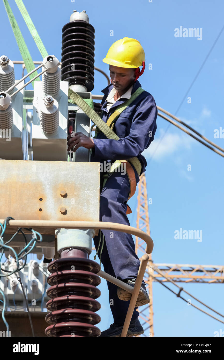 Working electricity lines africa hi-res stock photography and images ...