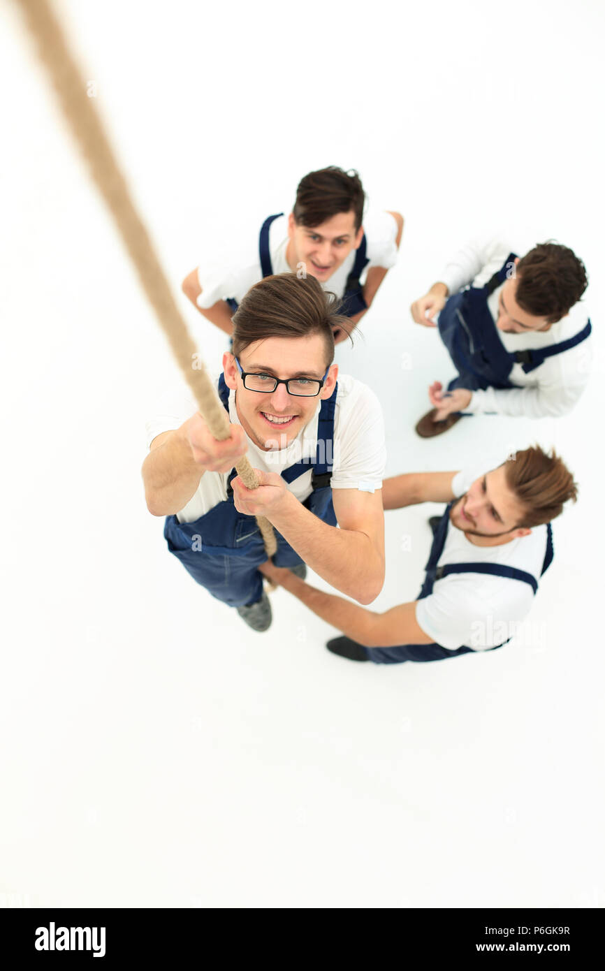 team, helping the leader to climb up the rope Stock Photo - Alamy