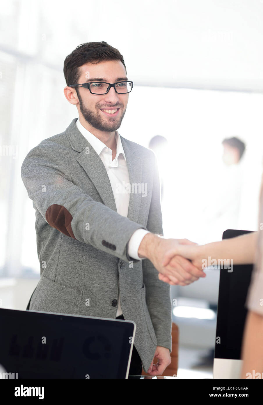 welcome handshake financial partners Stock Photo - Alamy