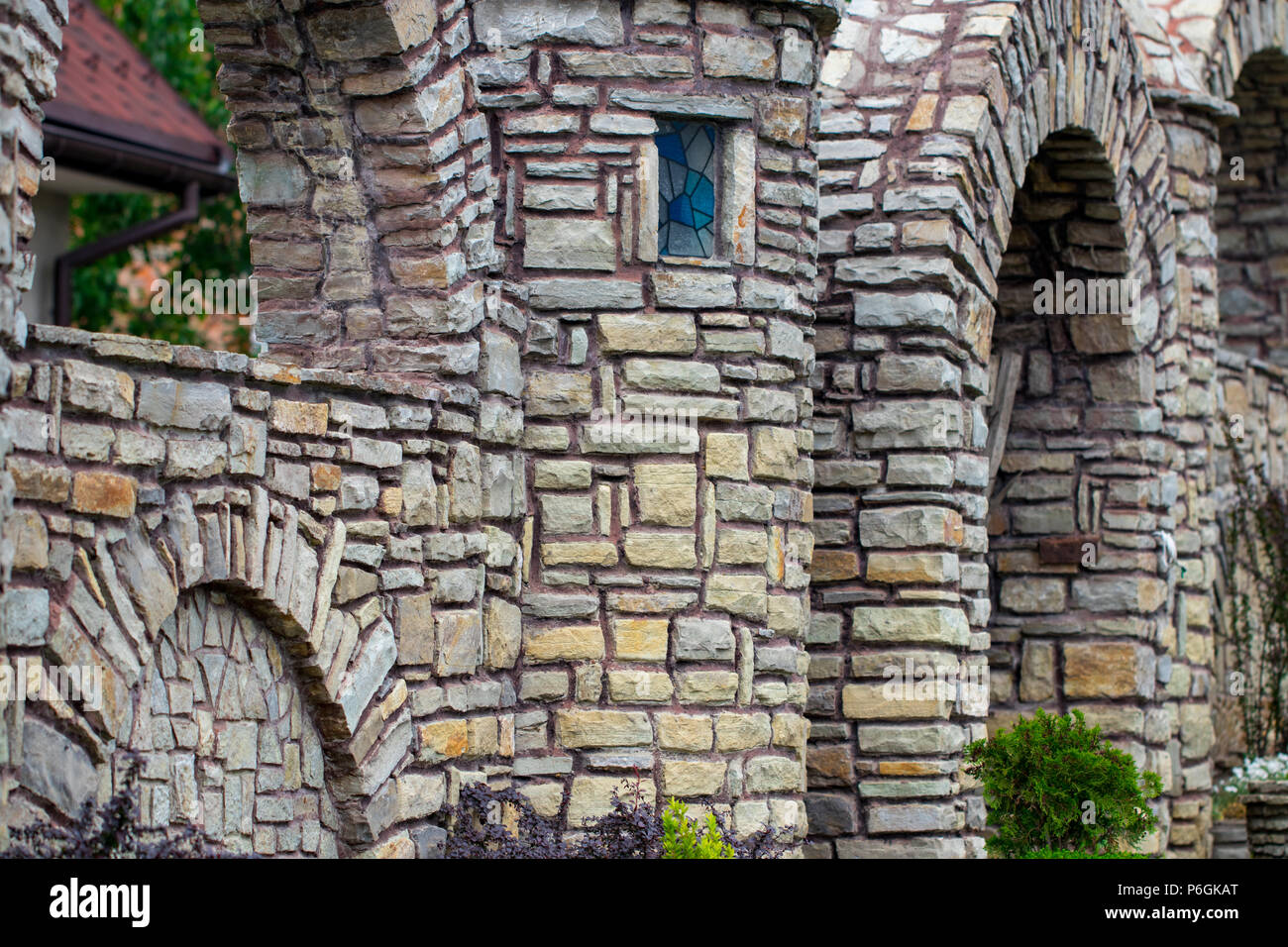 background texture stone fence.Gate near the house Stock Photo - Alamy