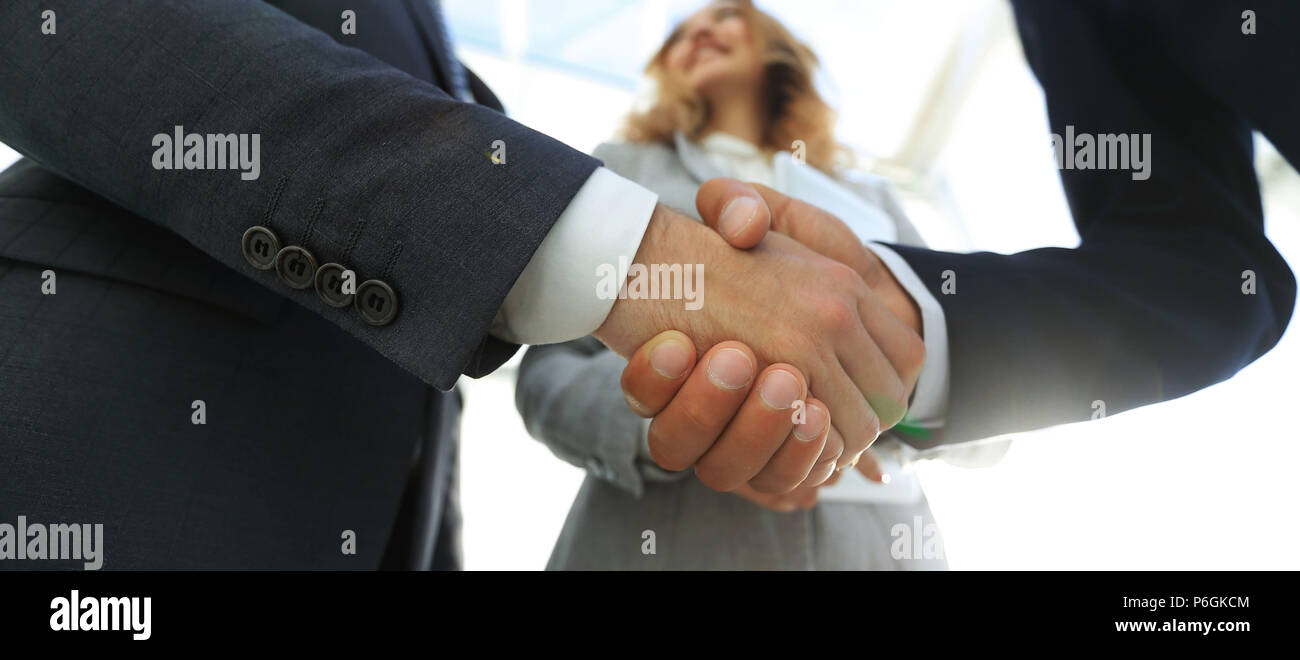 Photo of handshake of two happy businessmen Stock Photo - Alamy