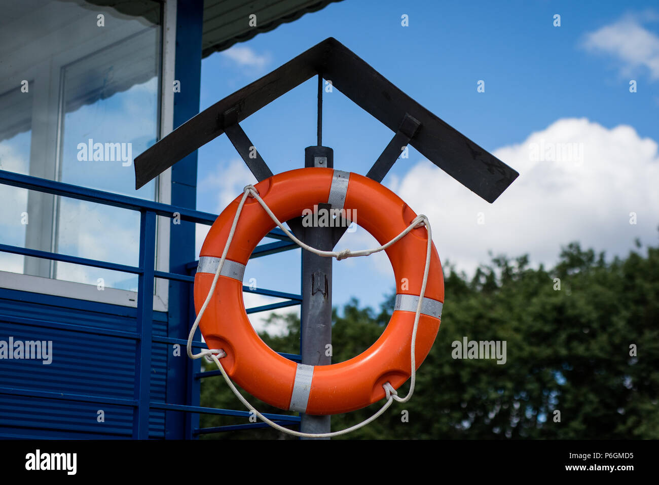 Lifebuoy suspended on the handle at the platform. Lifebuoy accessories ...