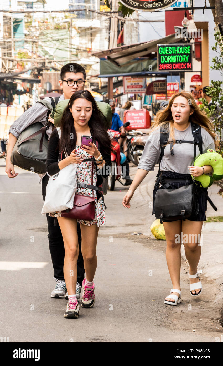 Street life night and day Ho Chi Minh (Saigon) Vietnam Stock Photo - Alamy