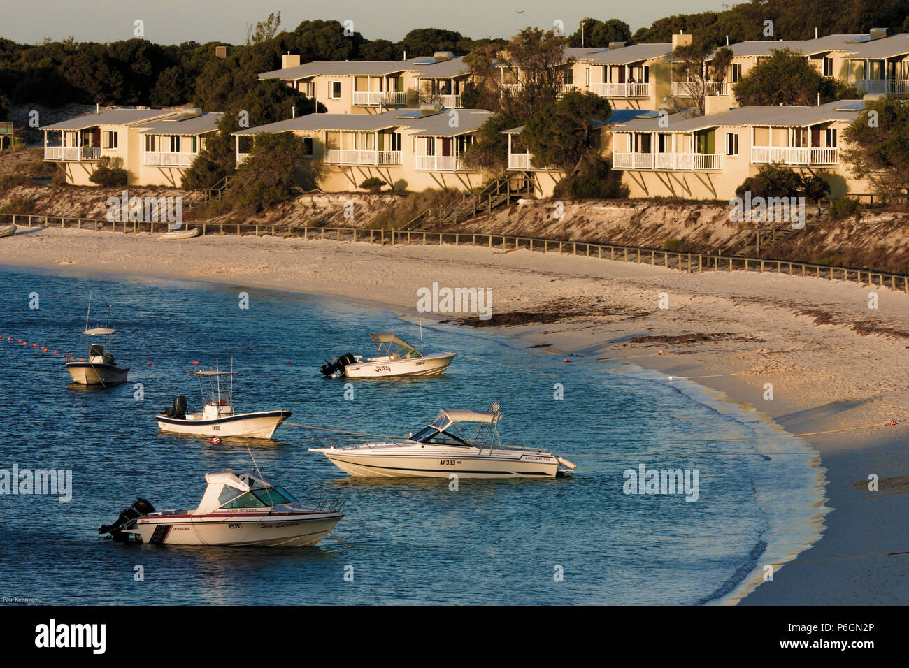 Anchored pleasure boats and holiday units at Longreach Bay on Rottnest ...