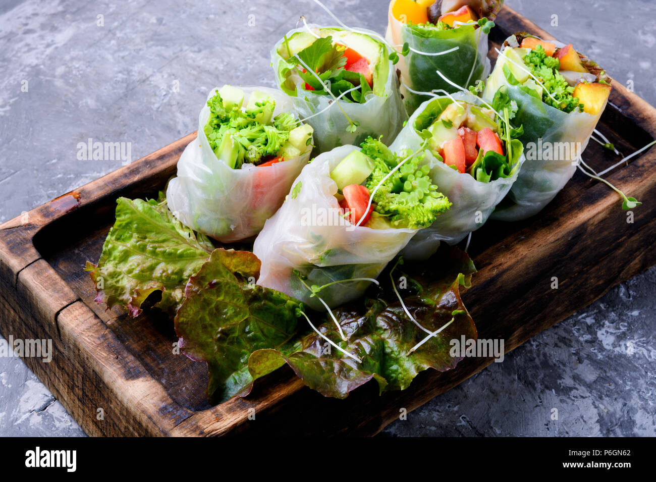Assorted Asian spring rolls with vegetable and lettuce Stock Photo - Alamy