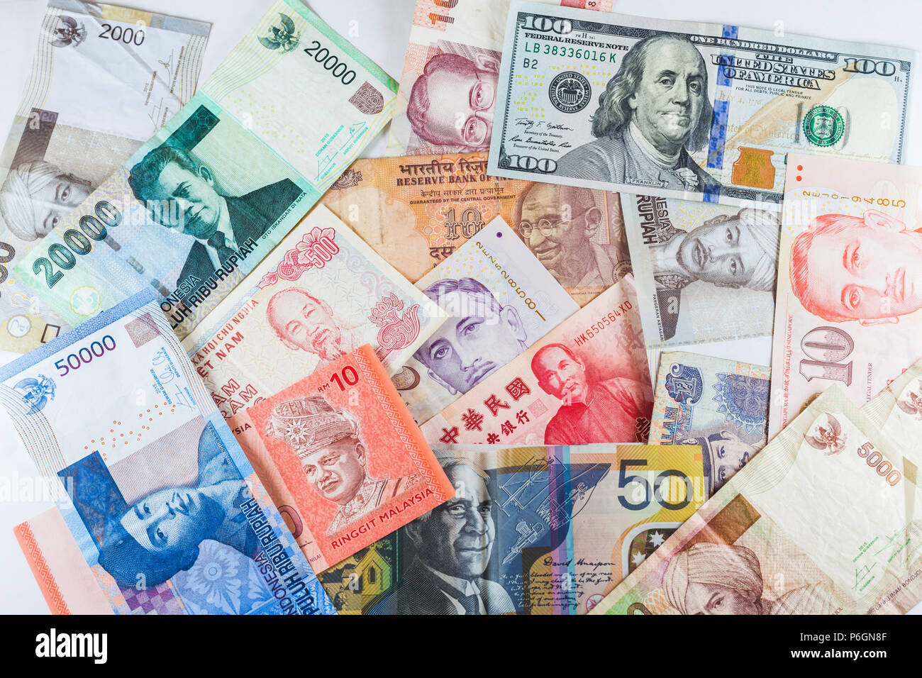 Multiple Currencies banknotes as colorful background showed the global ...
