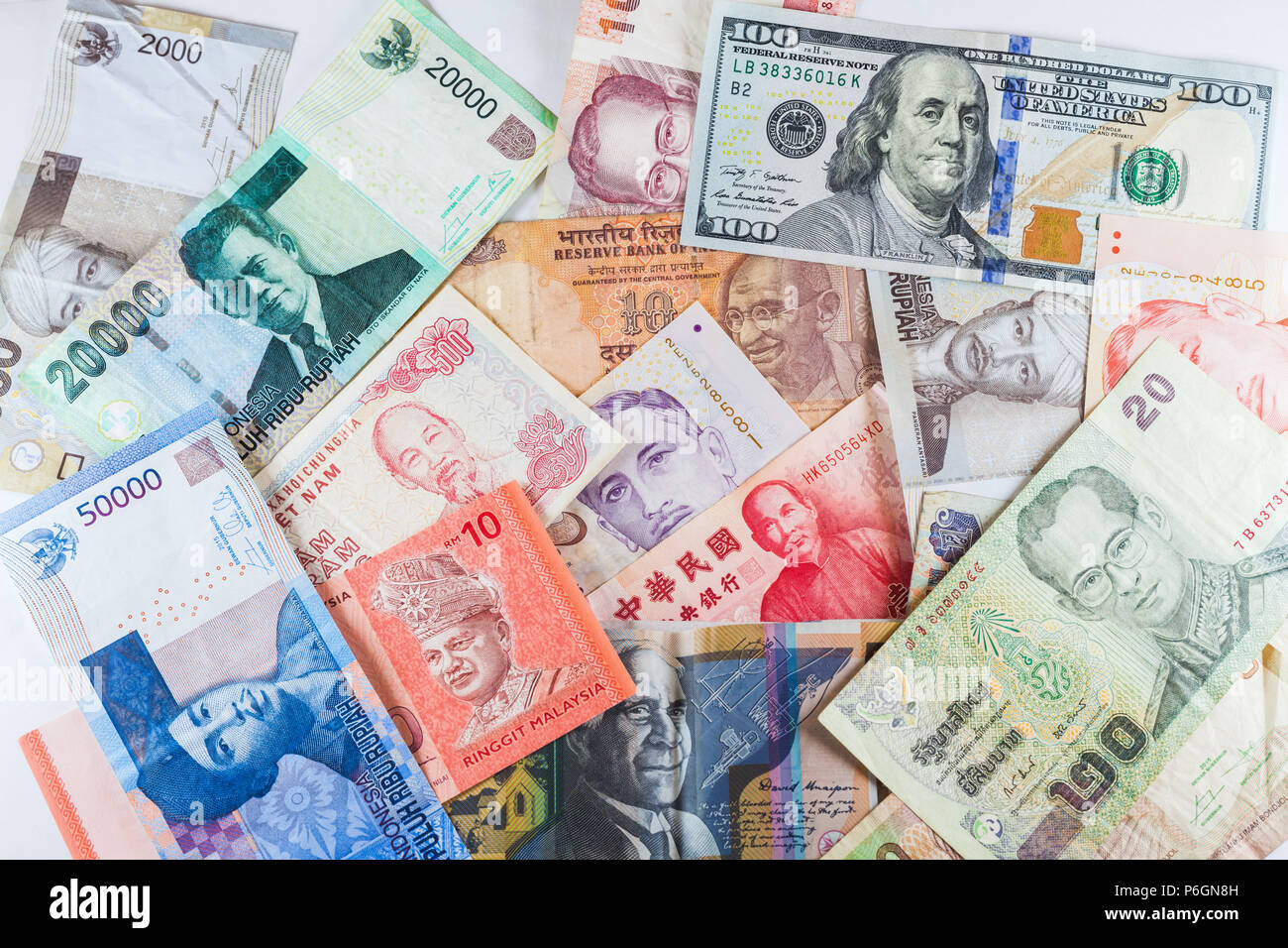 Multiple Currencies banknotes as colorful background showed the global ...
