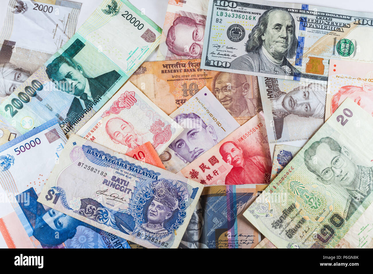 Multiple Currencies banknotes as colorful background showed the global ...
