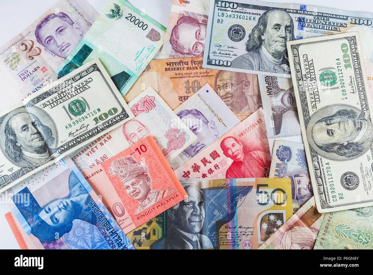 Multiple Currencies banknotes as colorful background showed the global ...