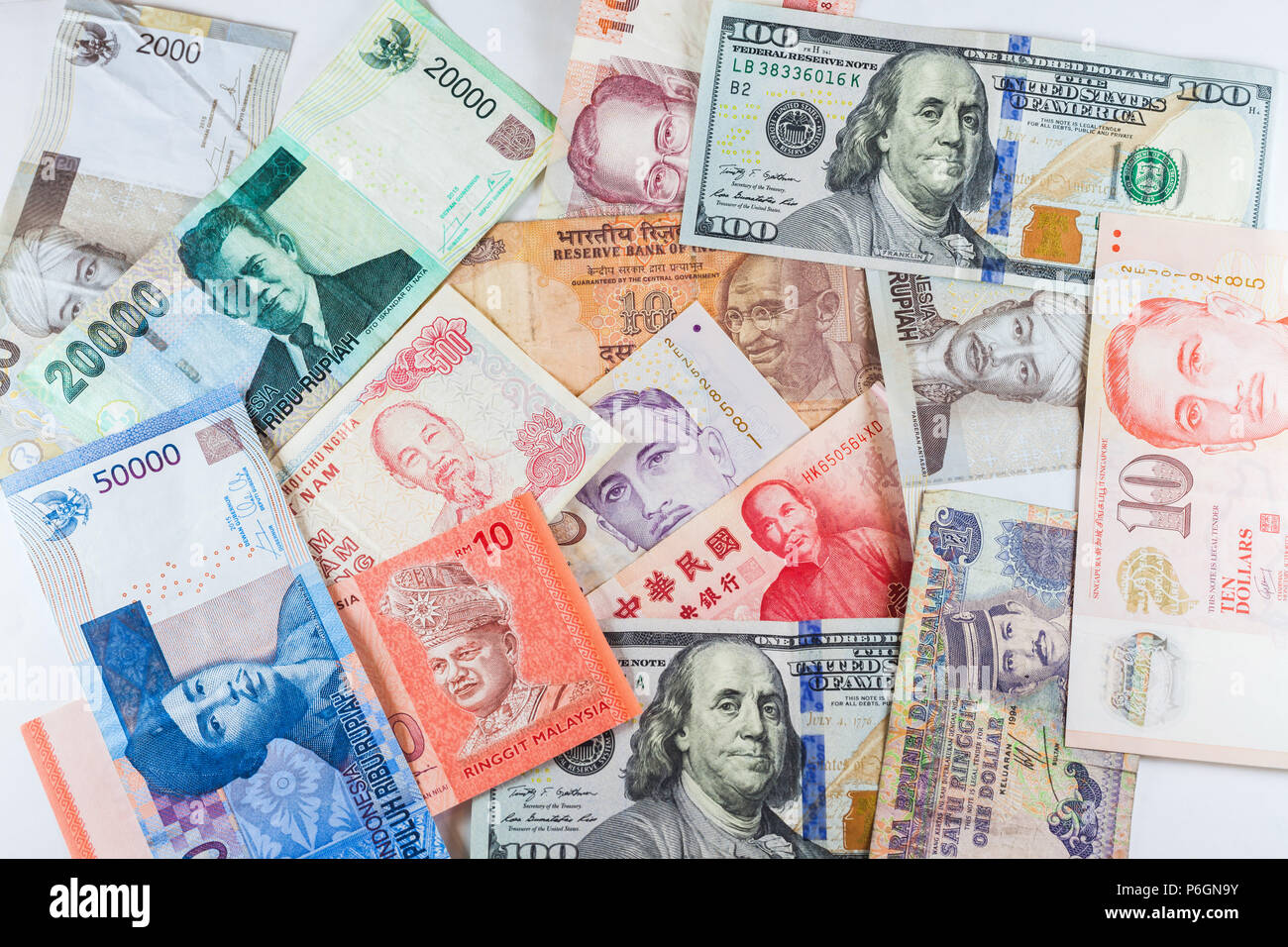 Multiple Currencies banknotes as colorful background showed the global ...