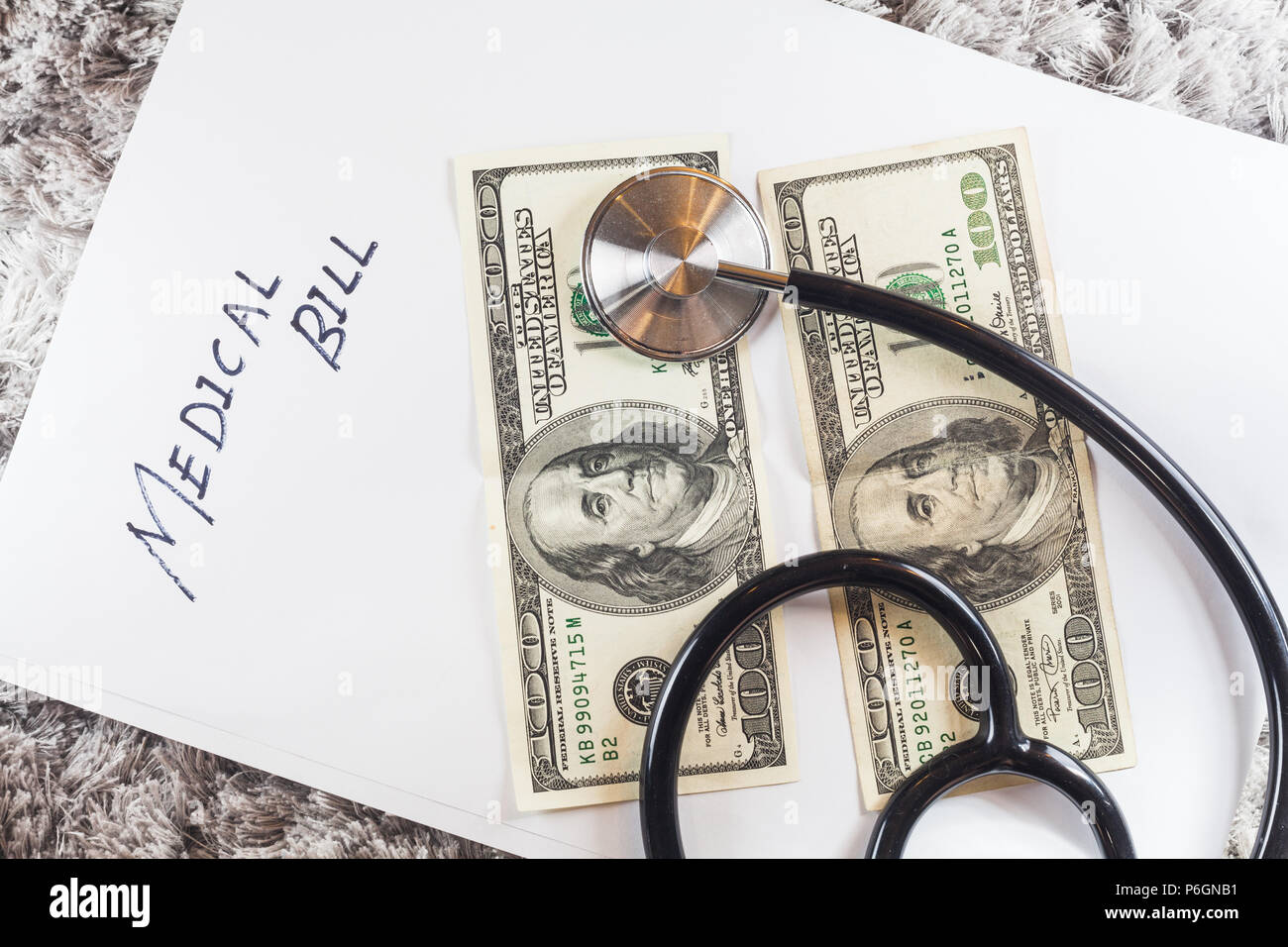 Stethoscope with wording of "Medical Bill" showing expensive healthcare ...