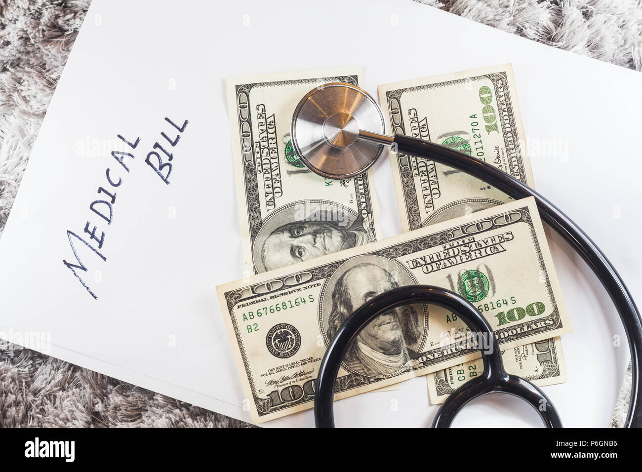Stethoscope with wording of "Medical Bill" showing expensive healthcare ...