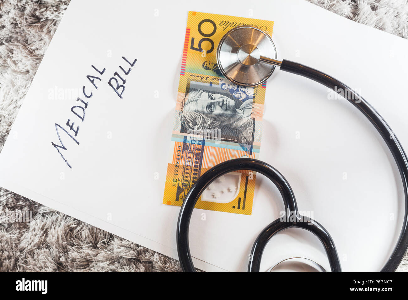 Stethoscope with wording of "Medical Bill" showing expensive healthcare ...