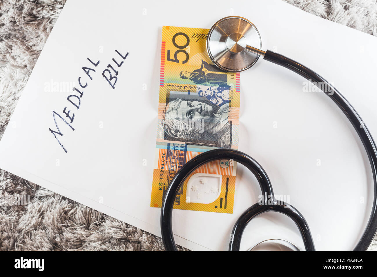 Stethoscope with wording of "Medical Bill" showing expensive healthcare ...
