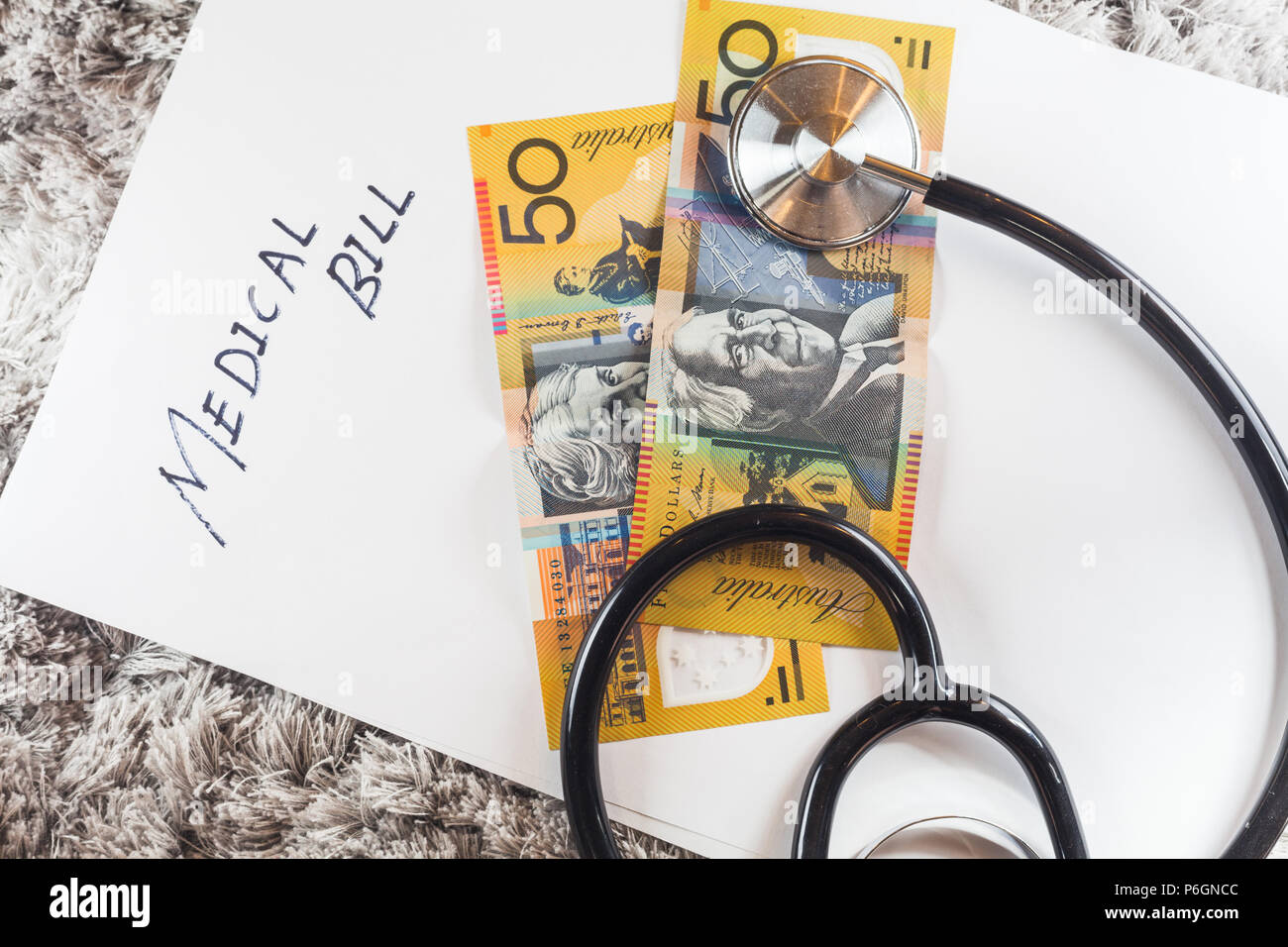 Stethoscope with wording of "Medical Bill" showing expensive healthcare ...