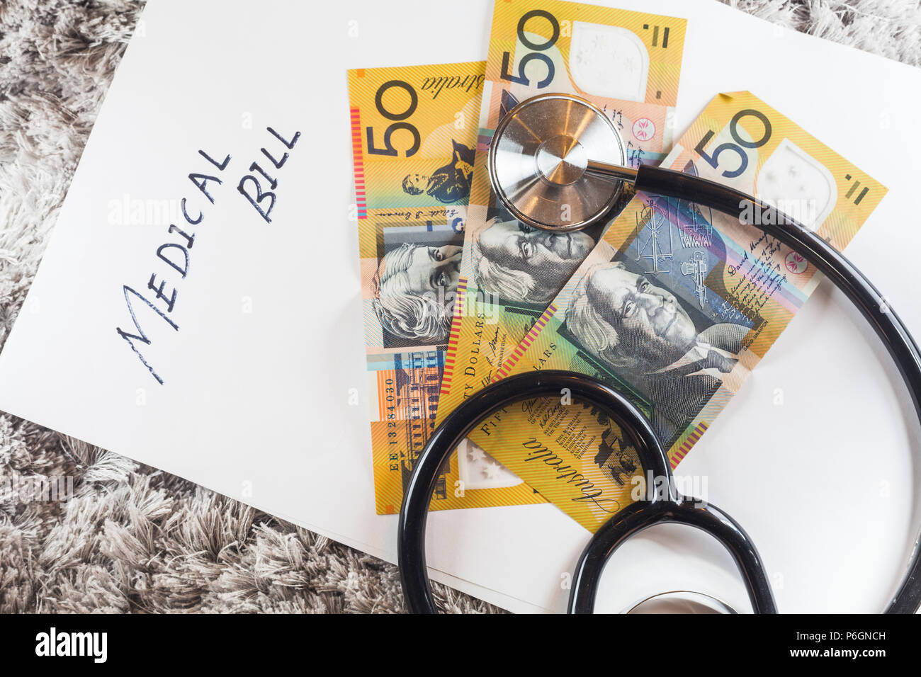 Stethoscope with wording of "Medical Bill" showing expensive healthcare ...