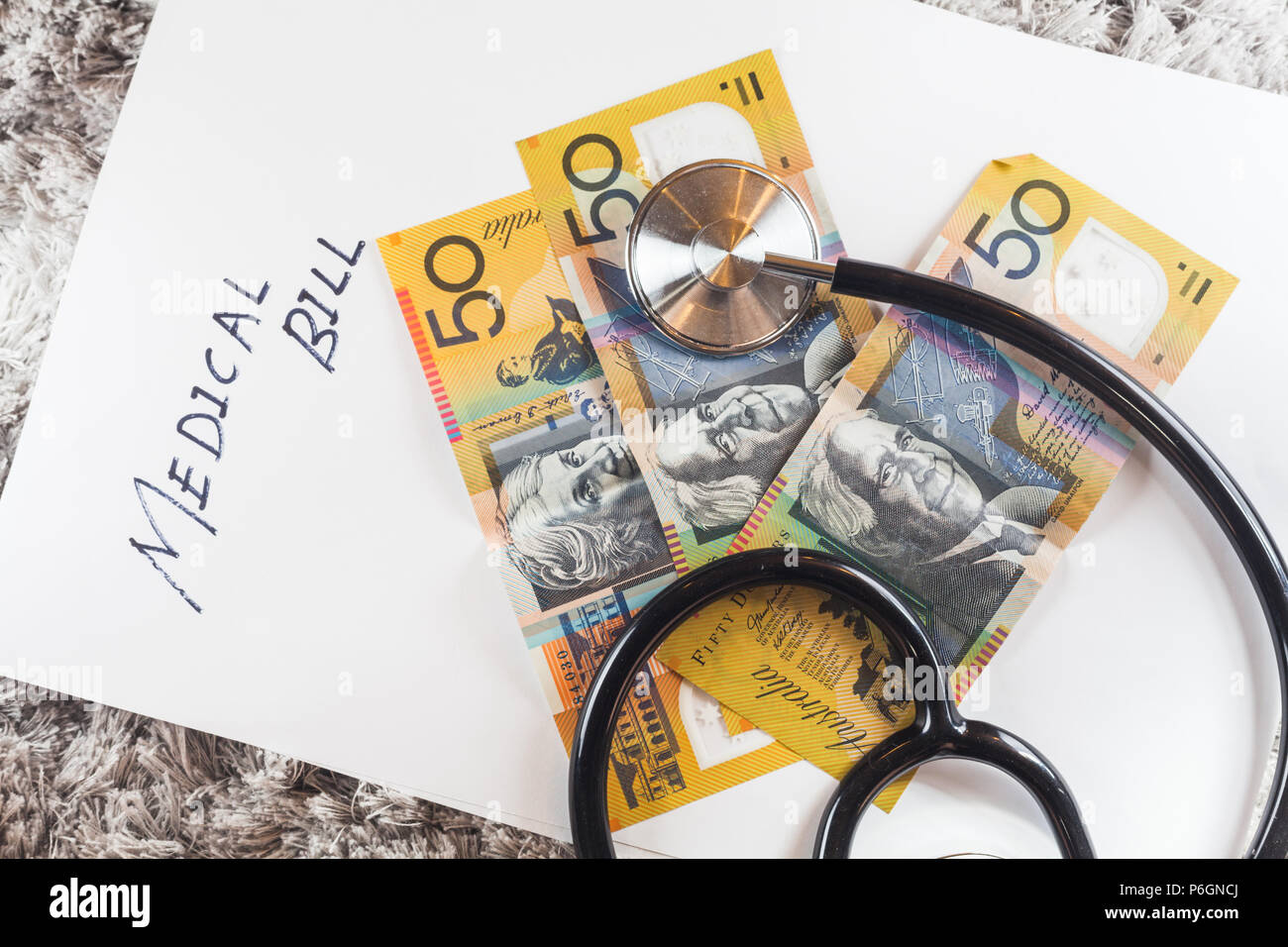 Stethoscope with wording of "Medical Bill" showing expensive healthcare ...