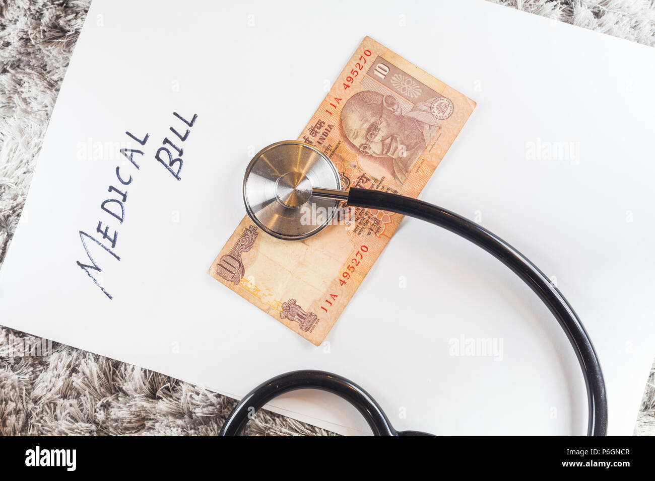 Stethoscope with wording of "Medical Bill" showing expensive healthcare ...
