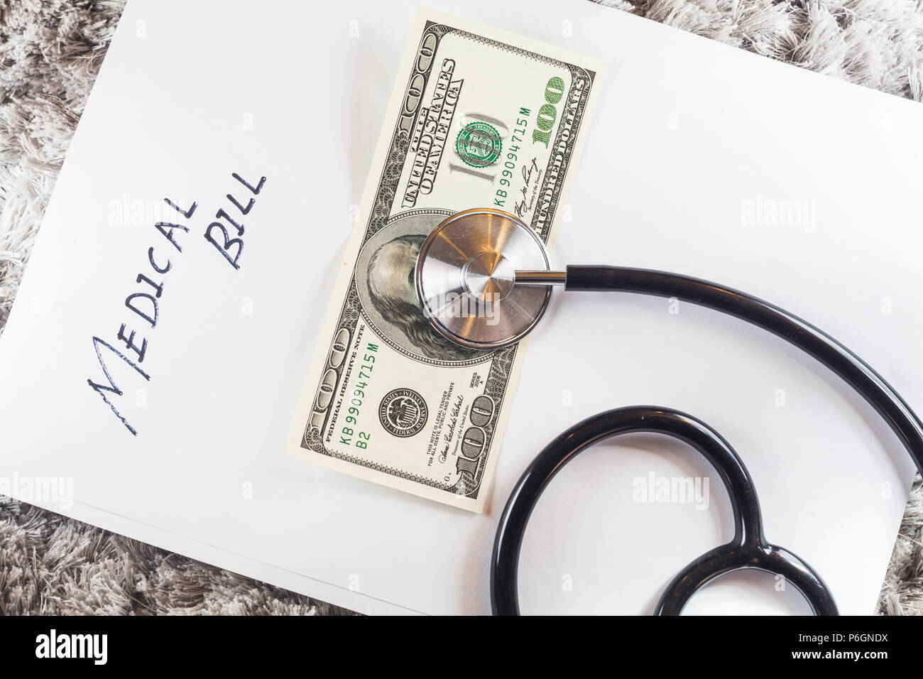 Stethoscope with wording of "Medical Bill" showing expensive healthcare ...