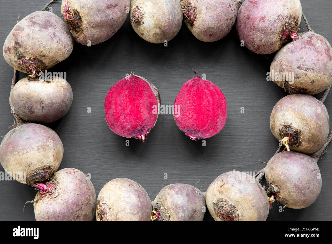 Red beetroot on black surface, top view. From above, overhead Stock ...
