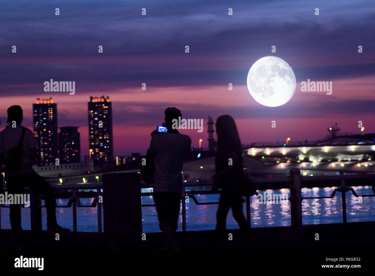 Travelers enjoy Full Moon night at Minatomirai in Yokohama, Japan Stock ...