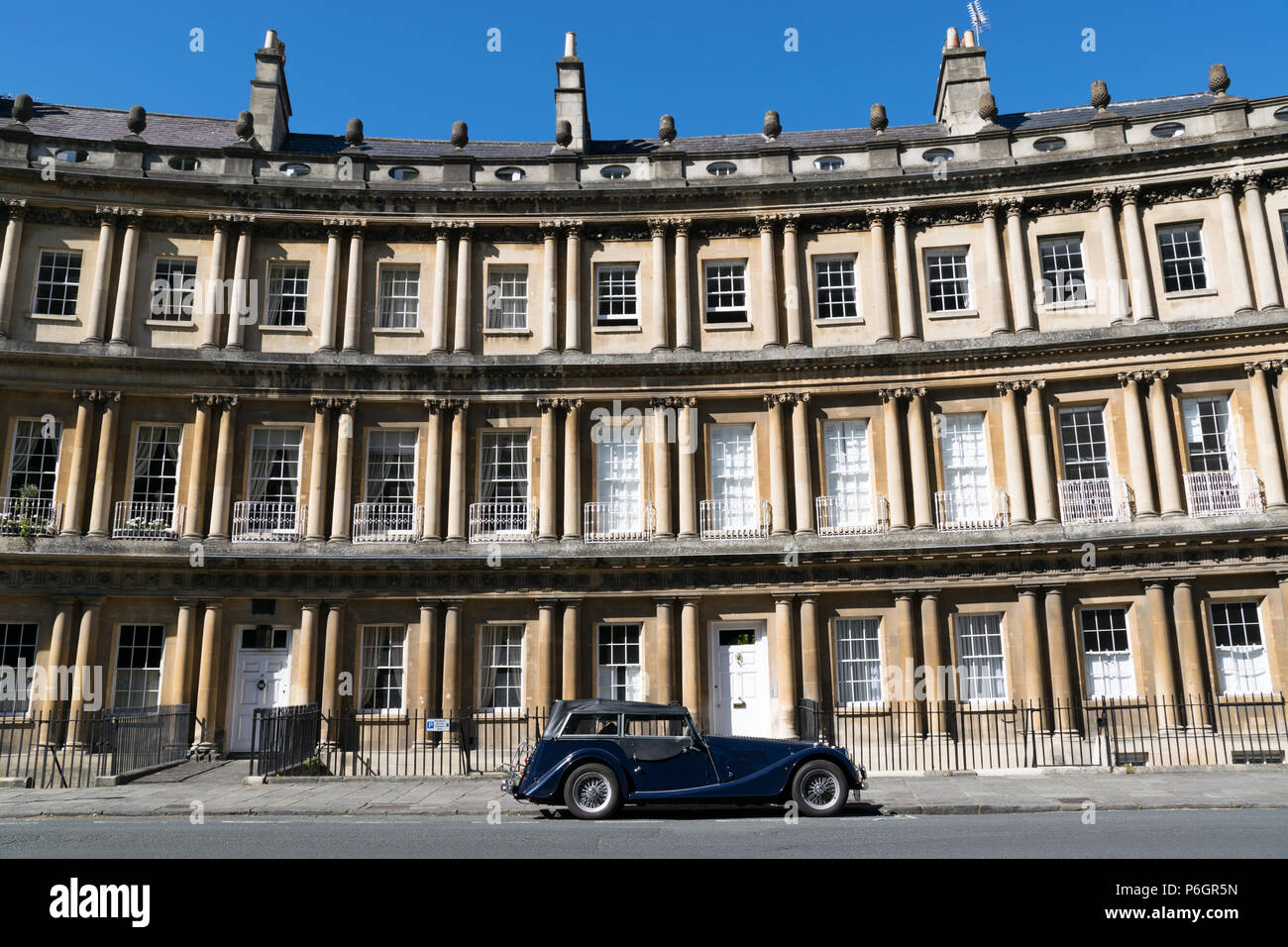 famous Georgian circle buildings and classical old car in the front in ...