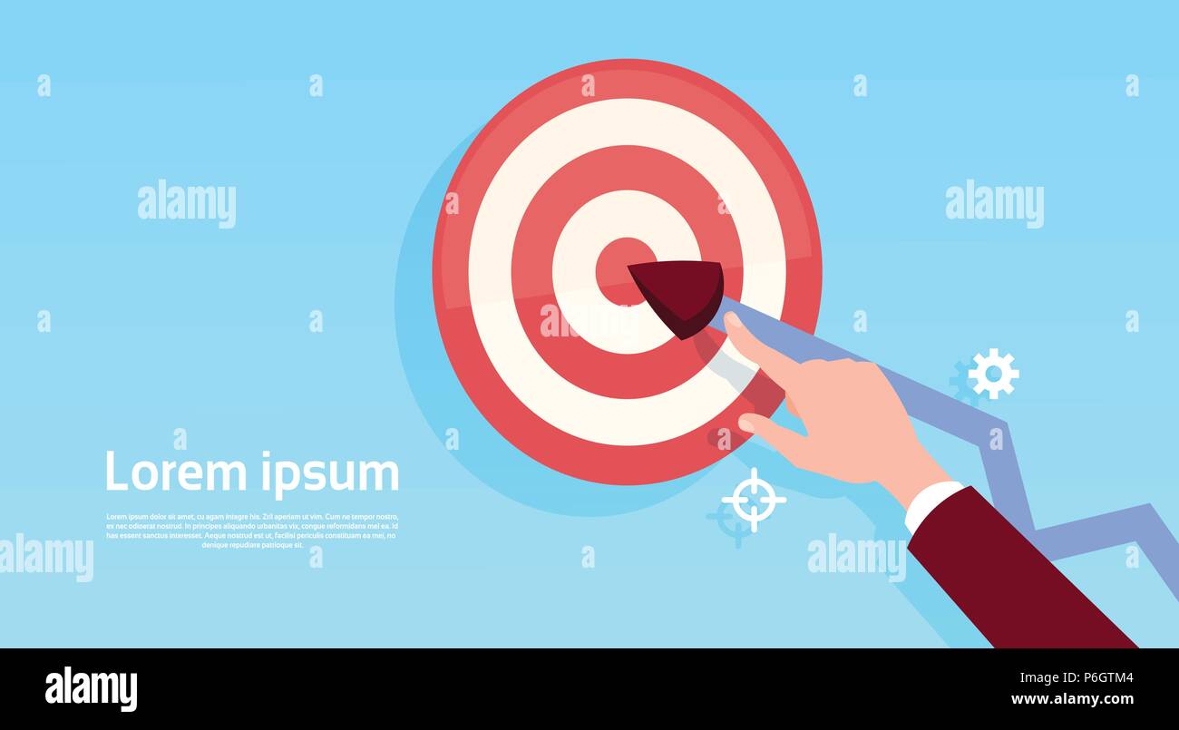 human hand holding arrow target point finger in center of dartboard ...