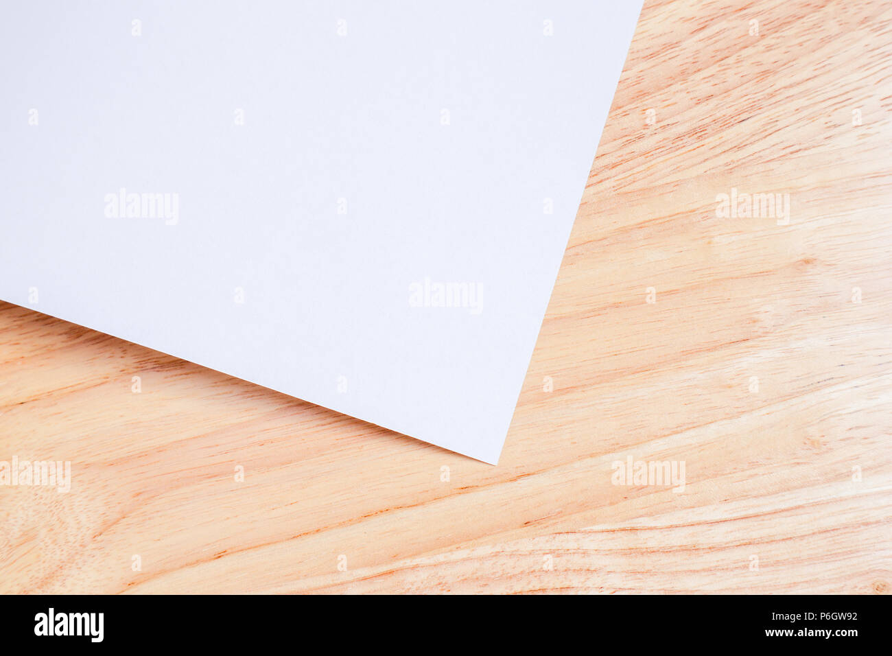 Recycled paper book on wooden background Stock Photo - Alamy