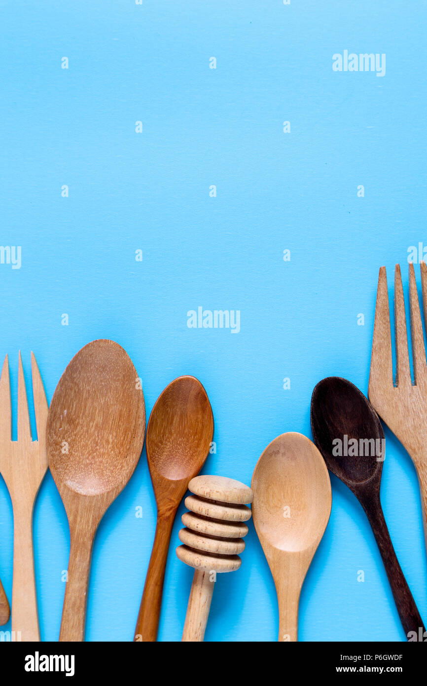 Wooden spoon on blue background, for background menu food Stock Photo ...