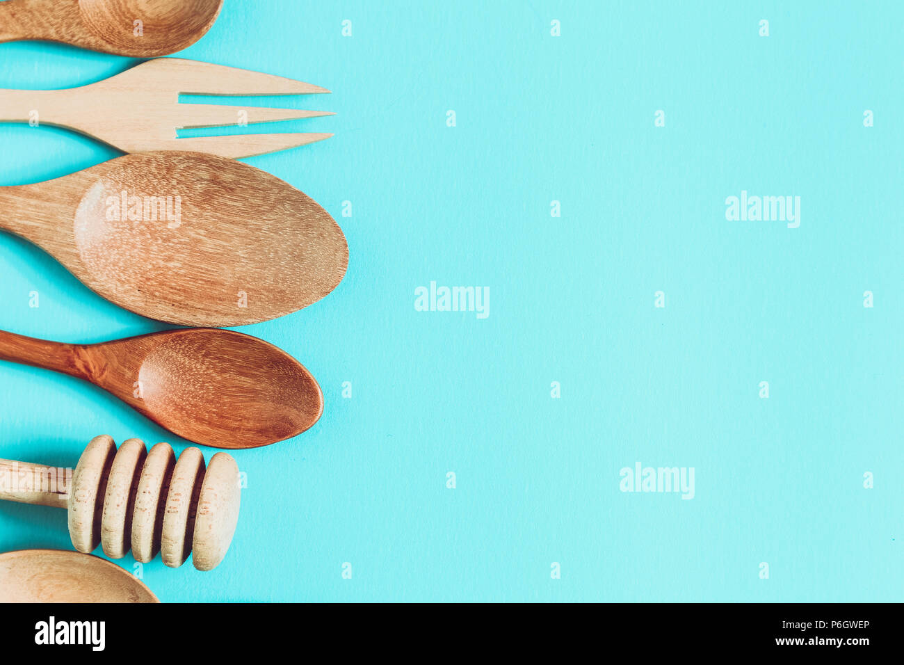 Wooden spoon on blue background, for background menu food Stock Photo ...