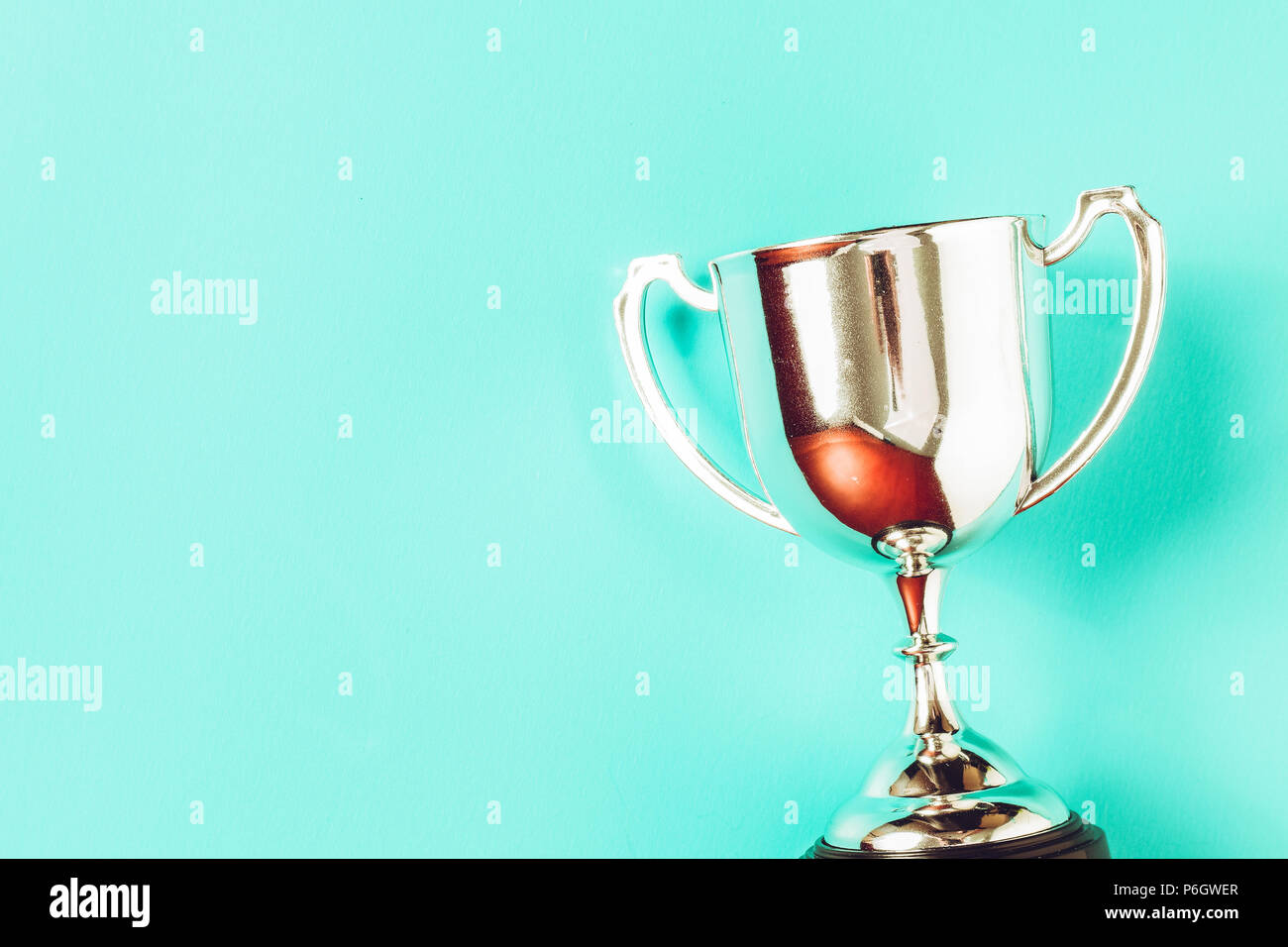 winner concept silver trophy placed with background Stock Photo - Alamy