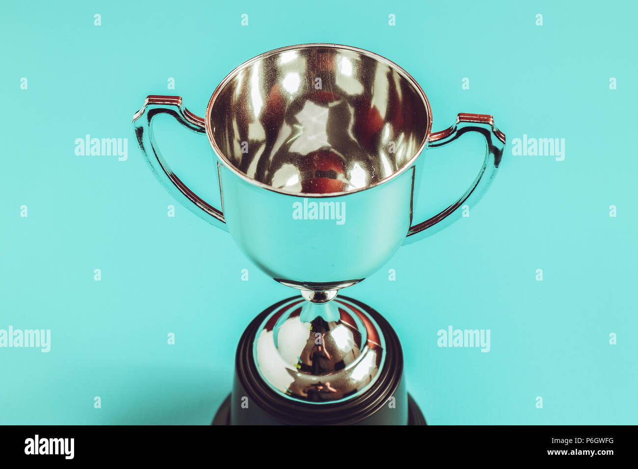 winner concept silver trophy placed with background Stock Photo - Alamy