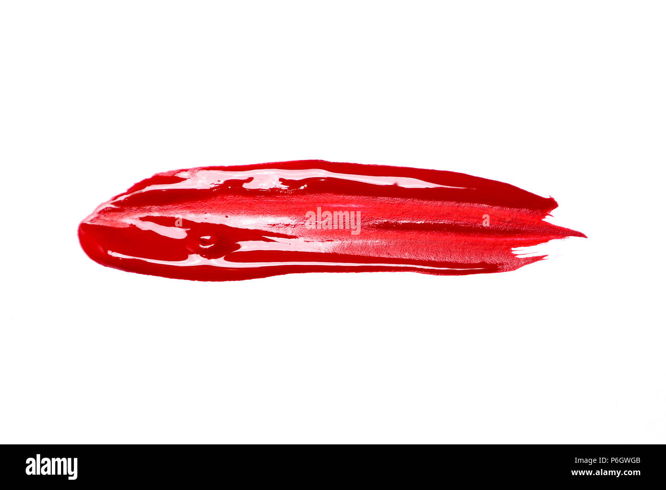 Red color lipstick stroke on white background Stock Photo - Alamy